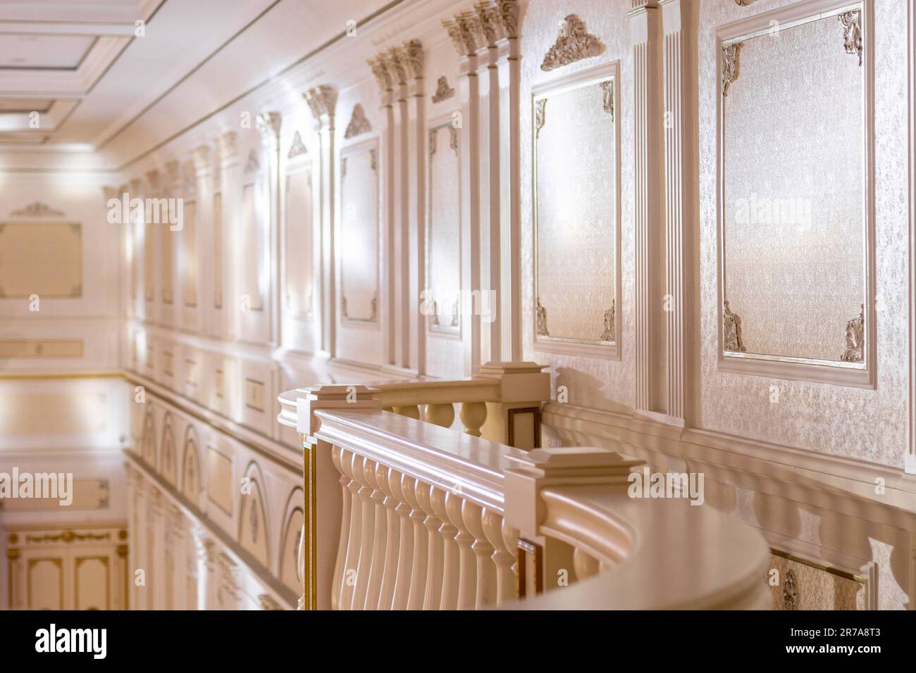 The interior of the event hall in a classic style with stucco on the ...