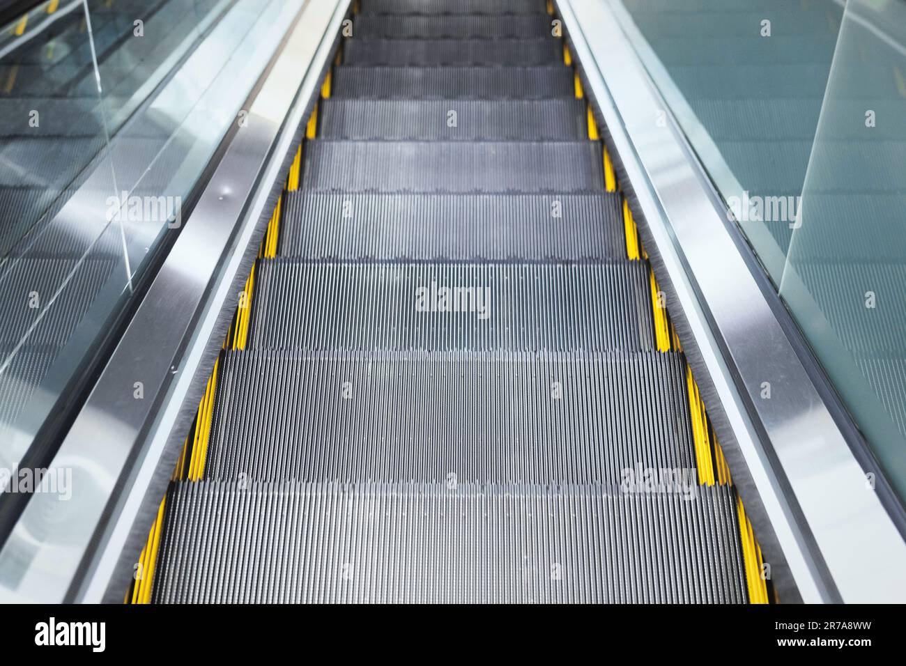 Top view on steps of escalator modern buildings or subway station Stock ...