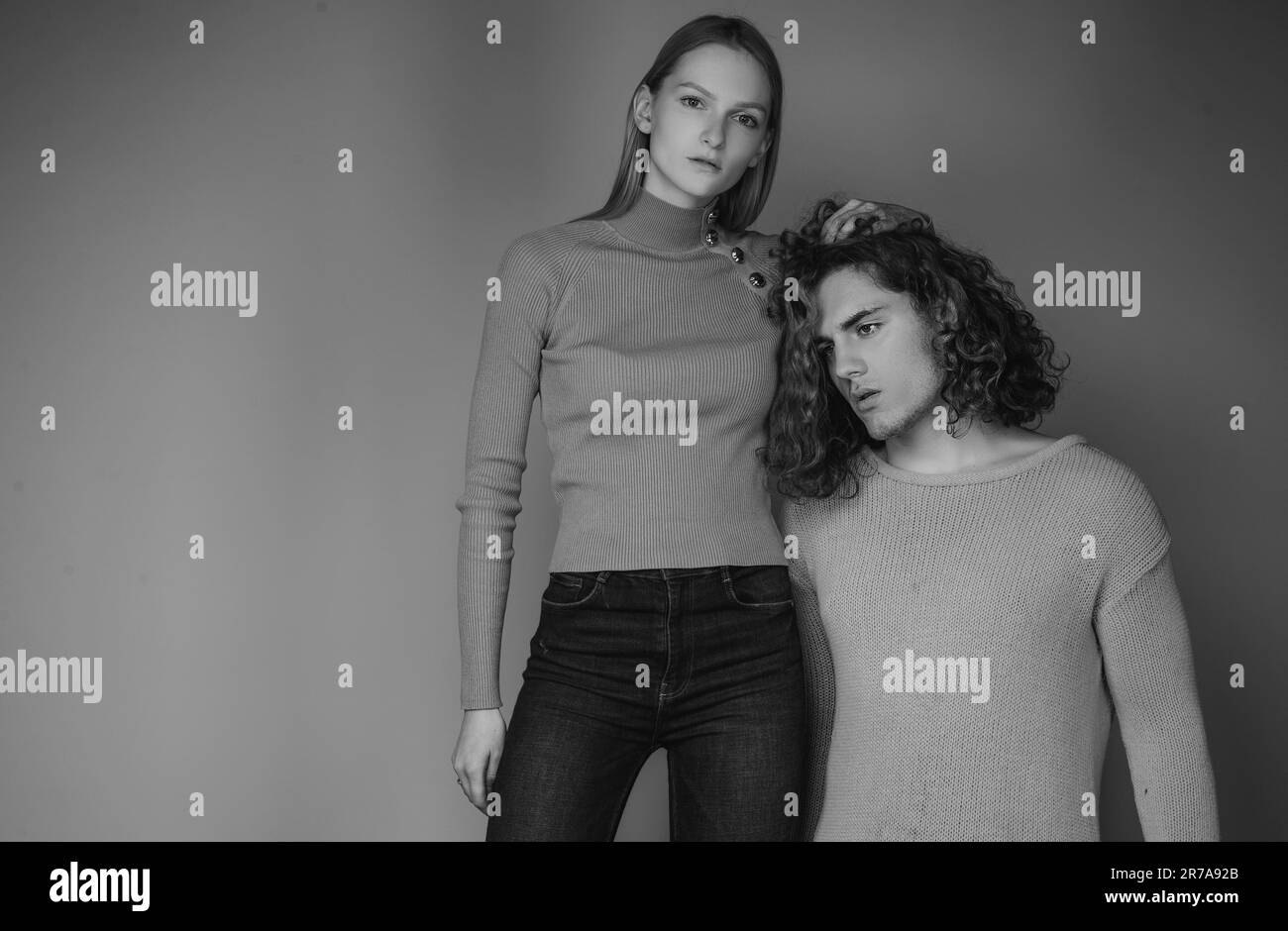 Portrait of a good-looking male and female, standing twogether. self ...