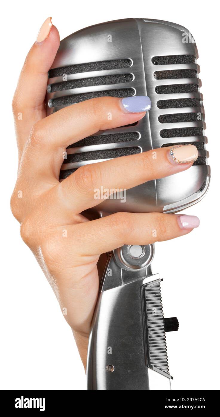 woman holding big retro microphone for singing Stock Photo - Alamy