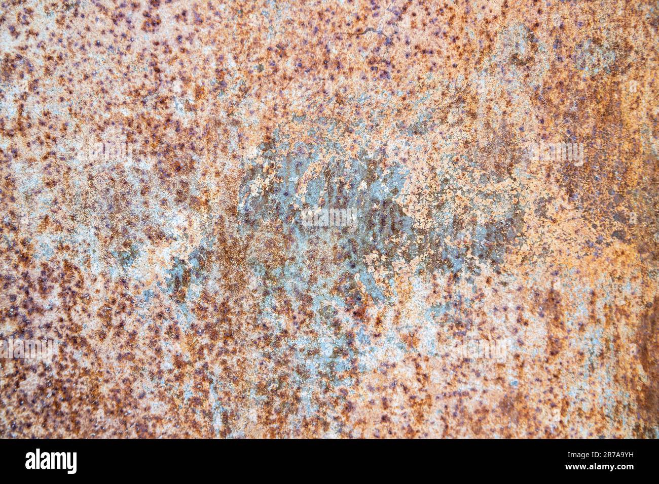 Old rusty metal texture on the surface of an iron sheet with pitting ...