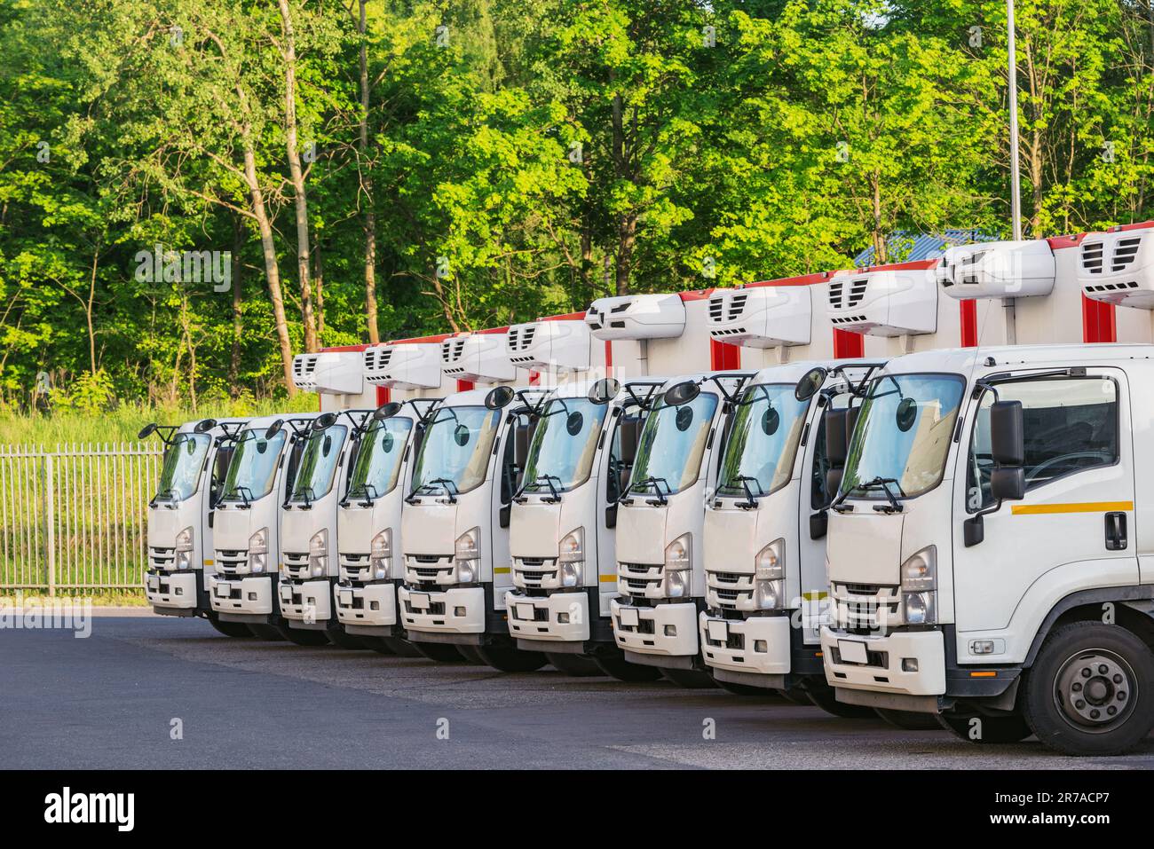 Freight trucks stand by the door of the storage Stock Photo - Alamy