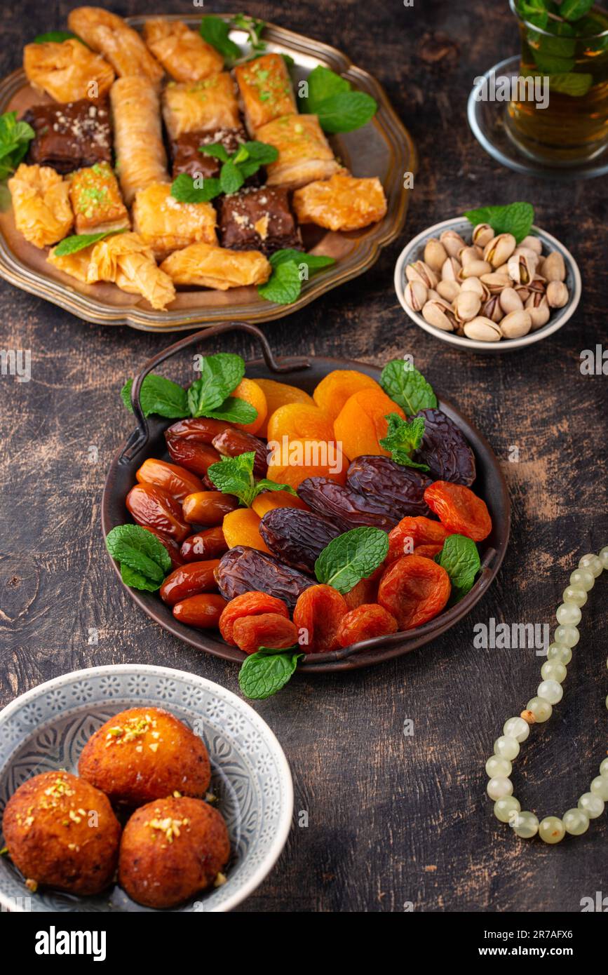 Ramadan iftar traditional desserts baklava and dates Stock Photo - Alamy