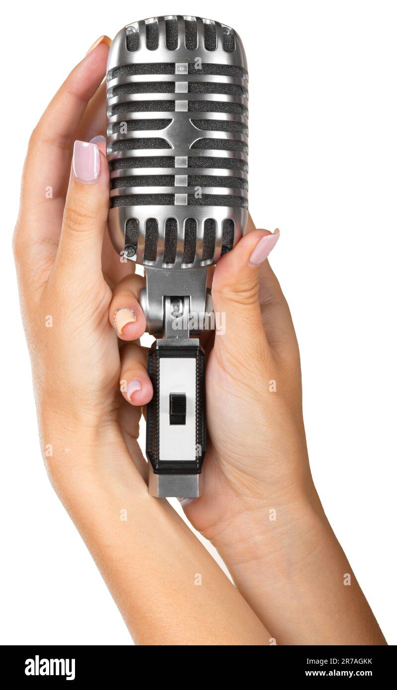 woman holding big retro microphone for singing Stock Photo - Alamy