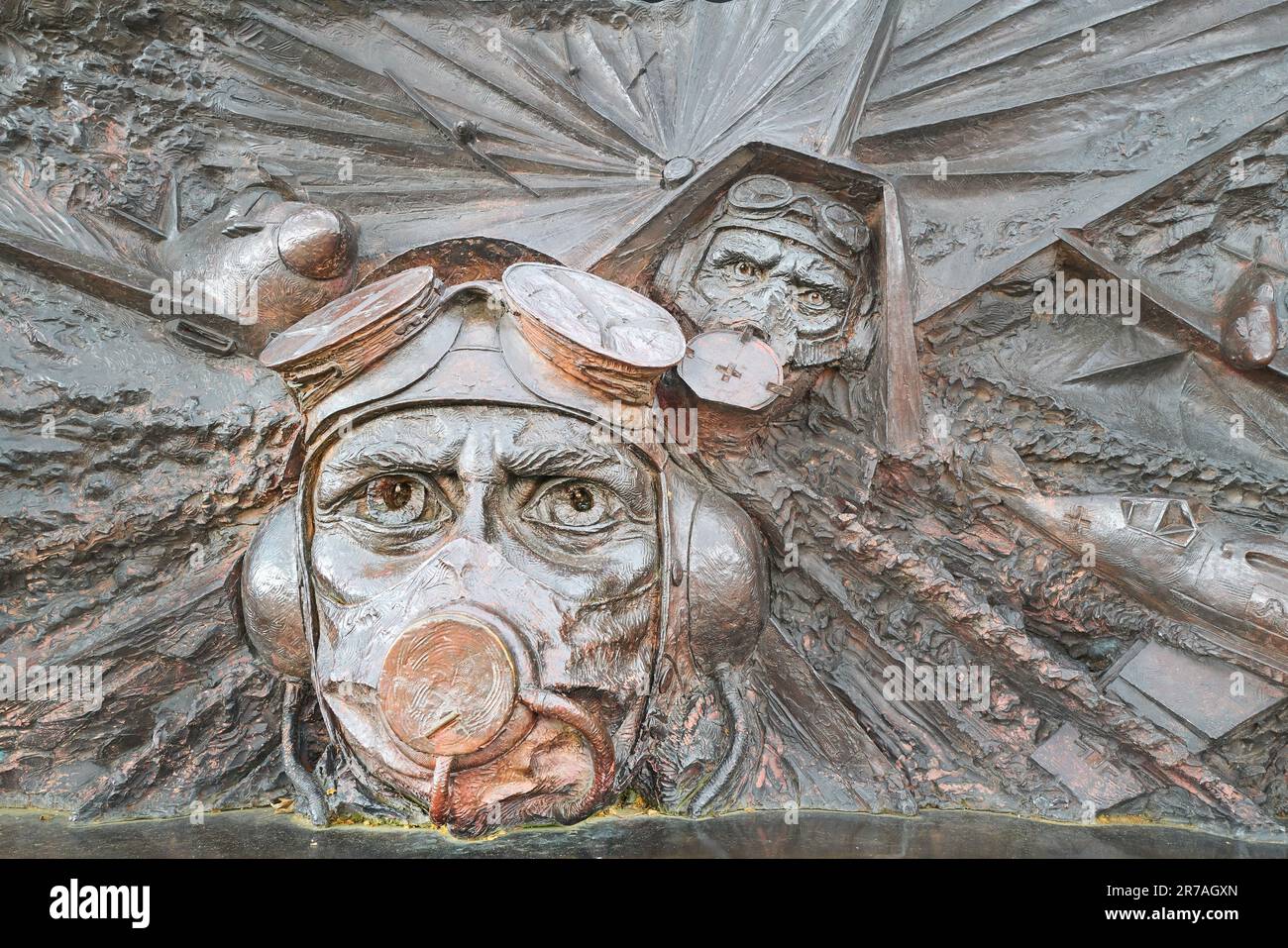 Sculpted helmeted face of an airplane fighter pilot on the memorial to ...