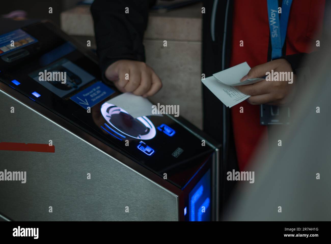 A person's hands holding tickets of Awana SkyWay. Genting Highlands ...