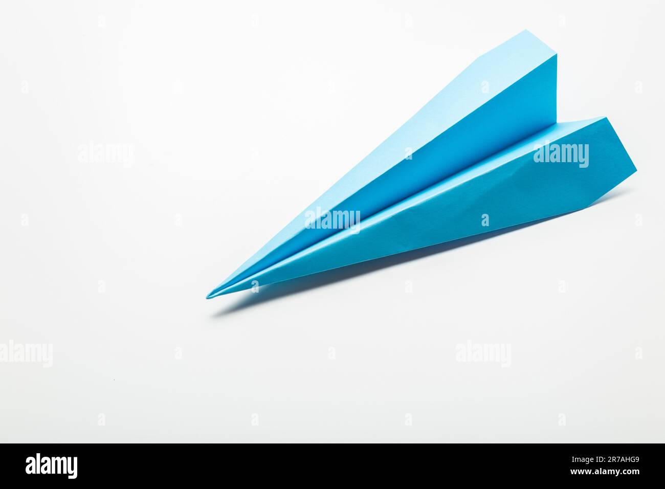 Origami paper airplane Stock Photo - Alamy