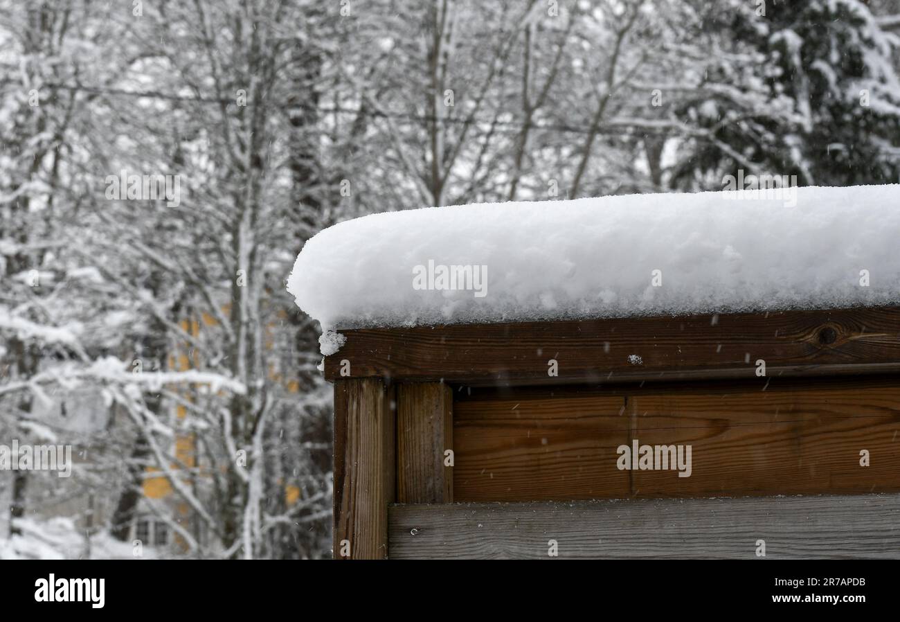 Snow-covered garden fence Stock Photo - Alamy