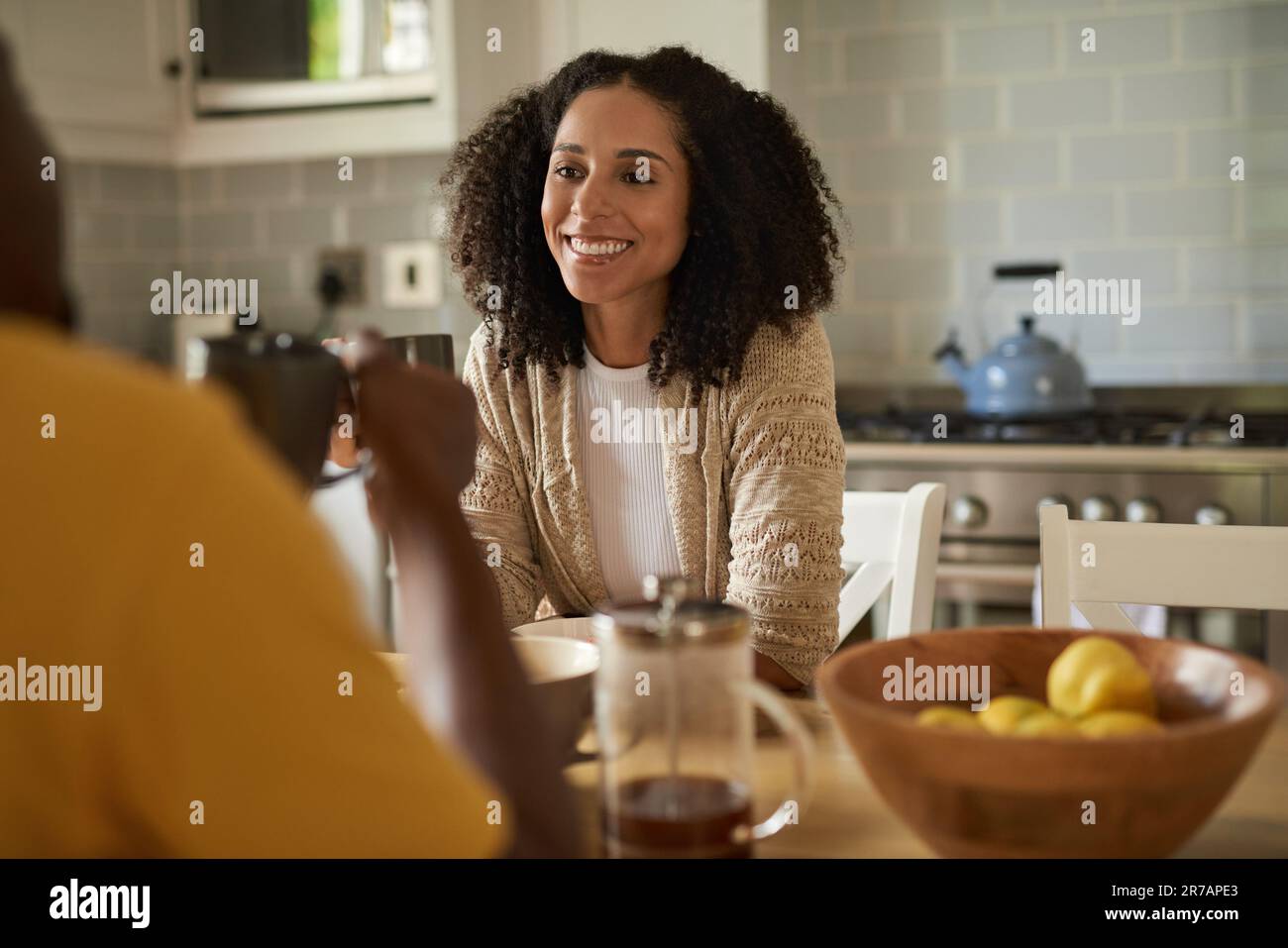 Happy biracial couple coffee talking hi-res stock photography and images - Alamy