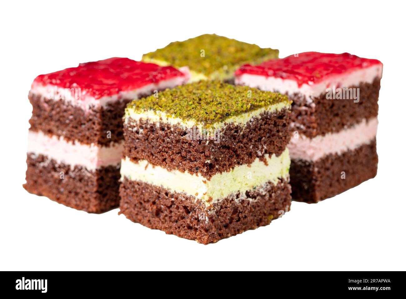 Small cake slices. Pistachio and raspberry cake slices. Set of ...