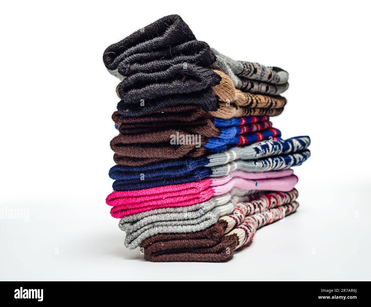 Warm wool socks folded in pile Stock Photo - Alamy