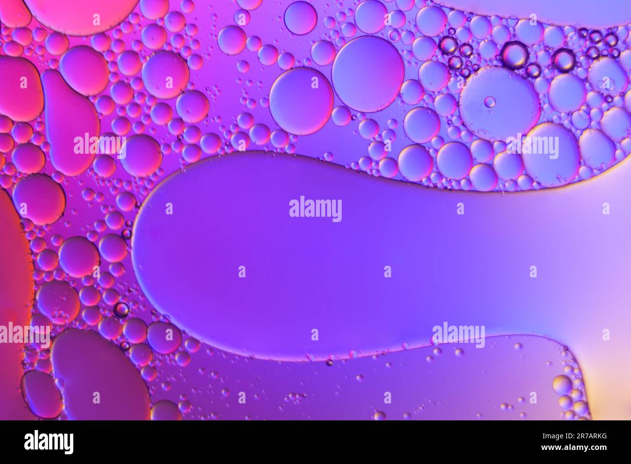 Top view movement of oil bubbles in the liquid. Oil surface ...