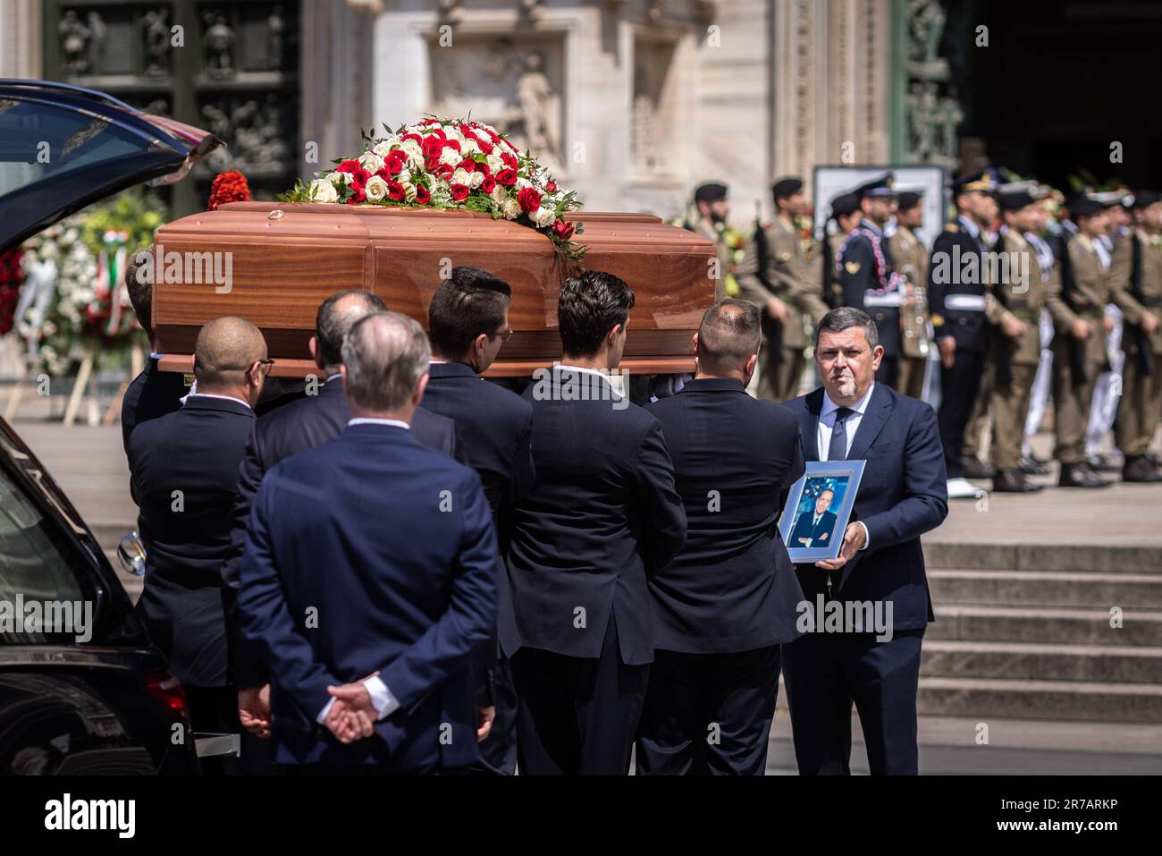 Mailand, Italy. 14th June, 2023. Pallbearers carry the coffin of former ...