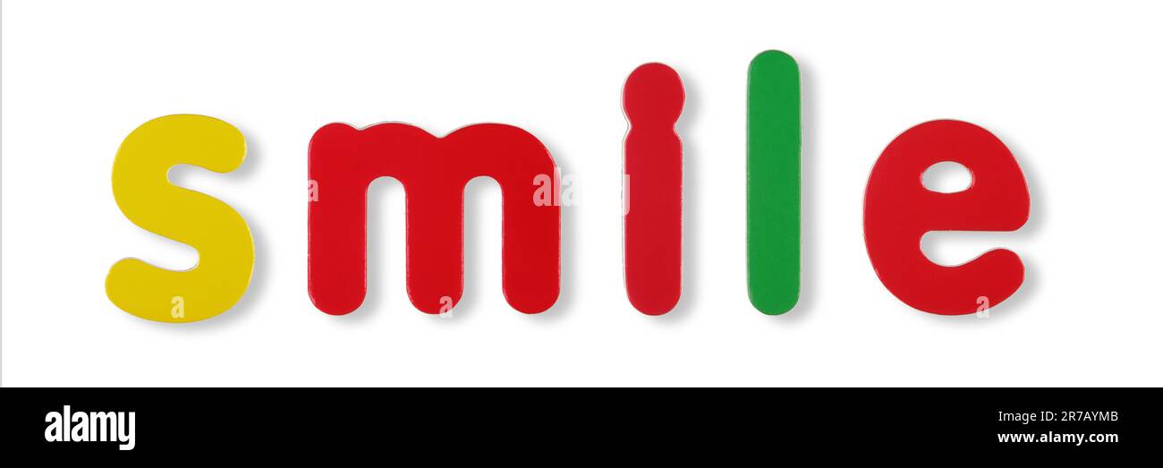 smile word coloured magnetic letters with clipping path Stock Photo - Alamy