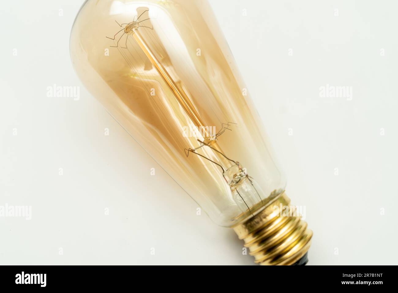 Vintage Edison lightbulb isolated on white Stock Photo - Alamy