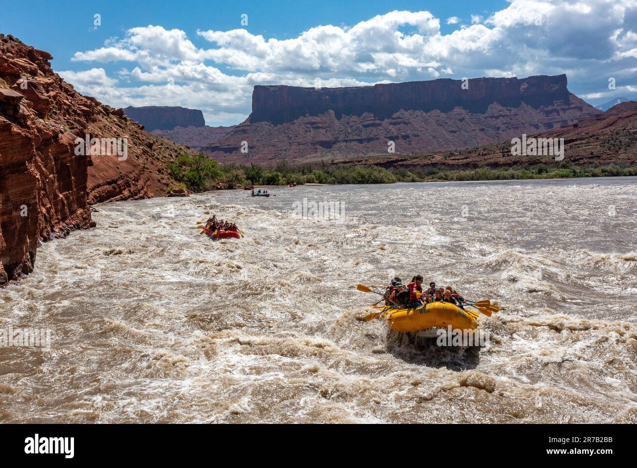 Tourists enjoy a rafting trip through the big waves in White's Rapid on ...