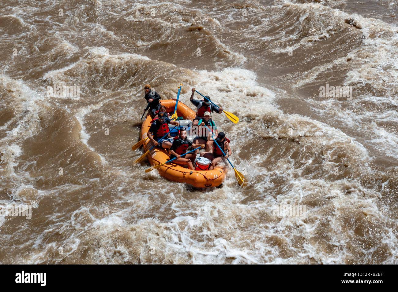 Tourists enjoy a rafting trip through the big waves in White's Rapid on ...