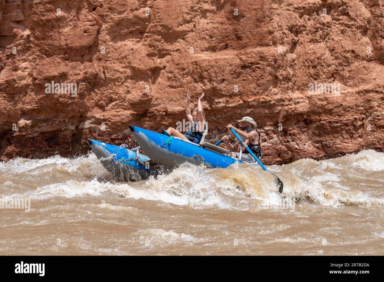 A father and daughter in an inflatable catamaran hit big waves in White ...