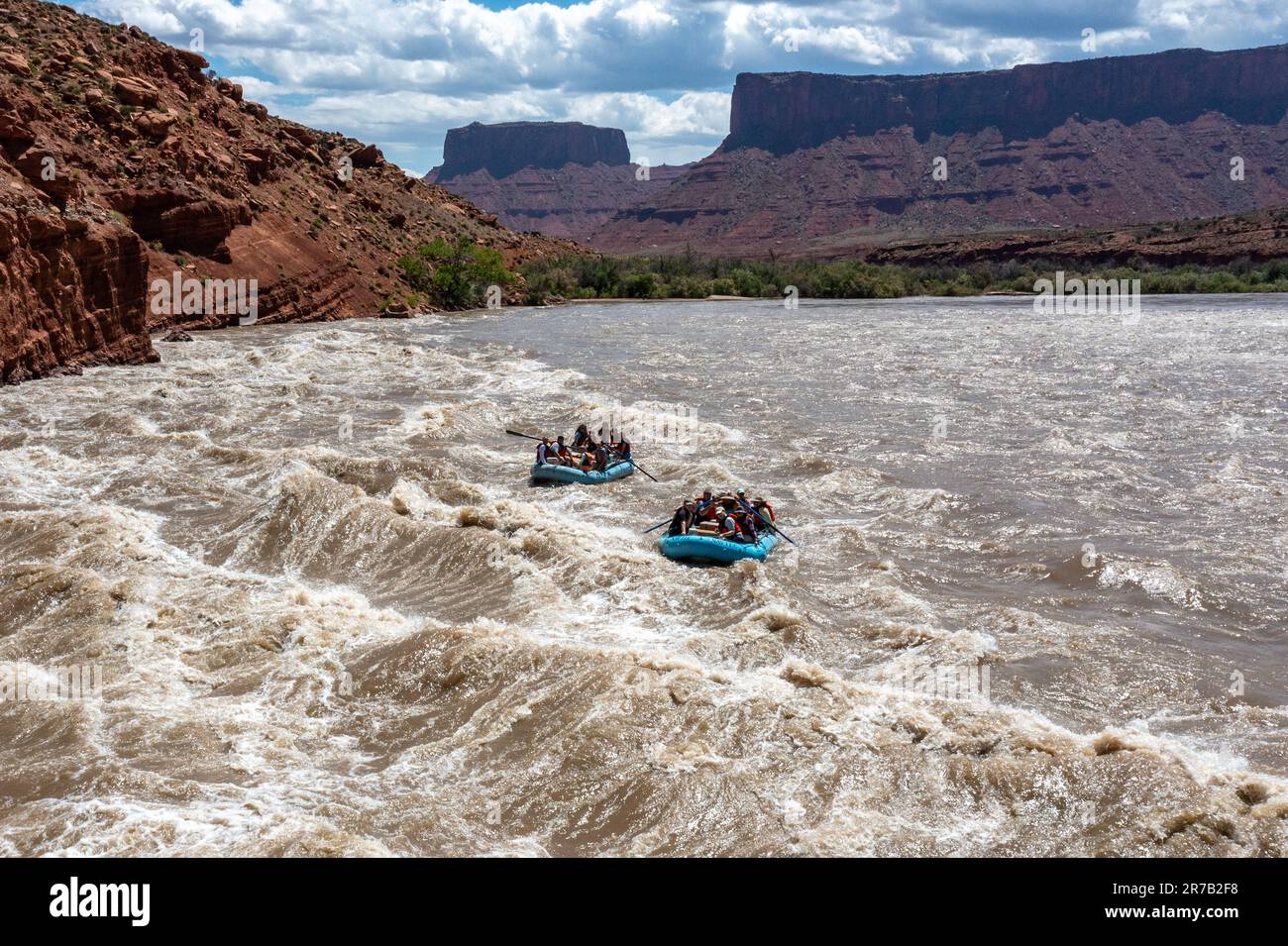 Tourists enjoy a rafting trip through the big waves in White's Rapid on ...