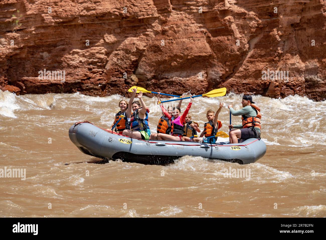 Tourists enjoy a rafting trip through the big waves in White's Rapid on ...