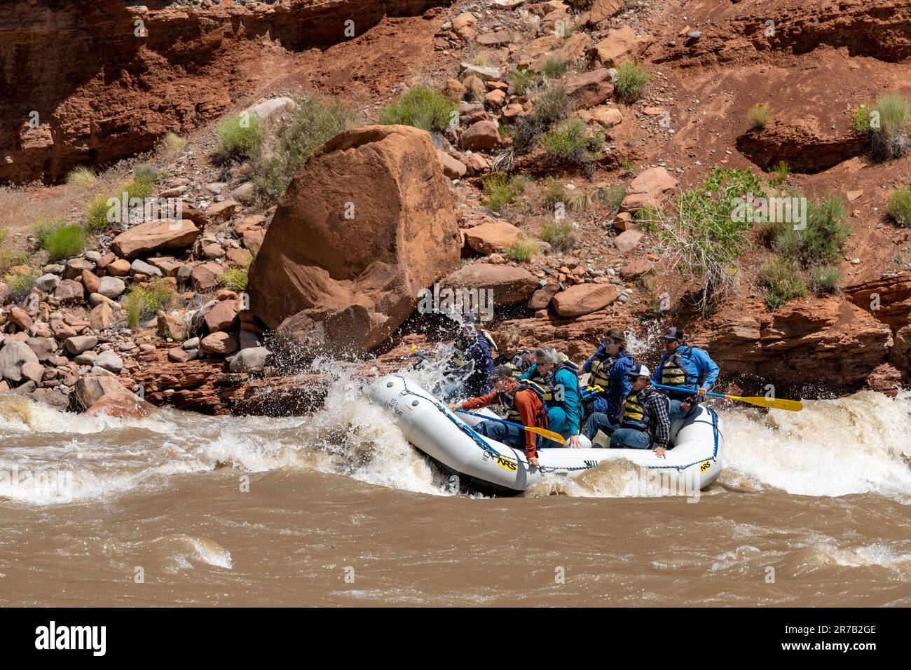 Tourists get splashed on a rafting trip through the big waves in White ...