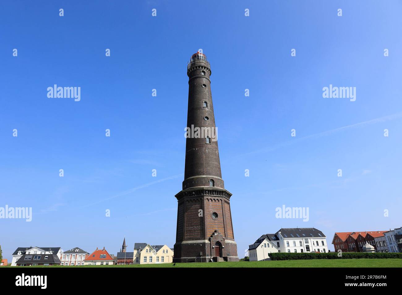 Lighthouse on the island of Borkum against a blue sky Stock Photo - Alamy