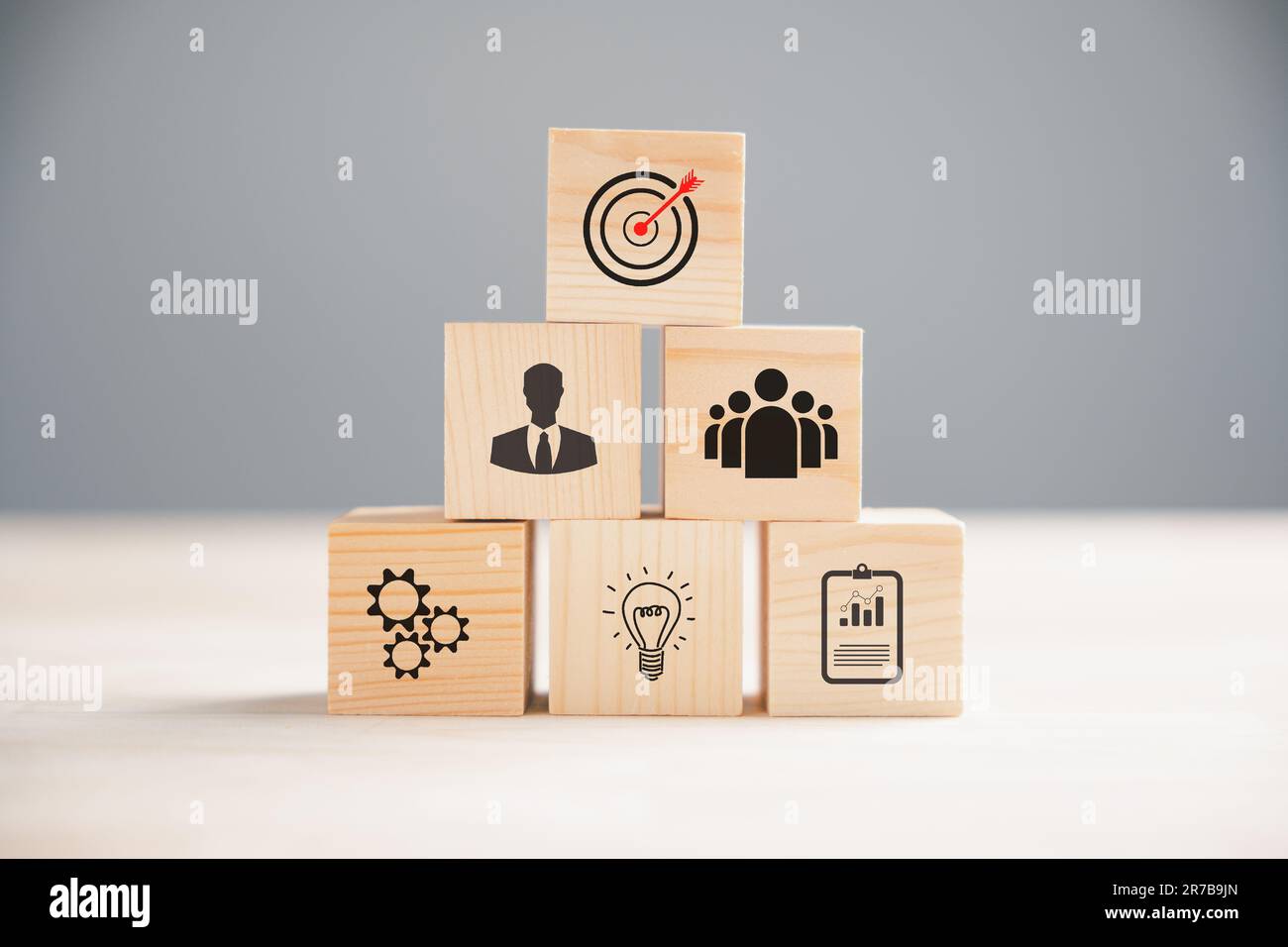 Wooden block cude step on table with Action Plan Stock Photo - Alamy