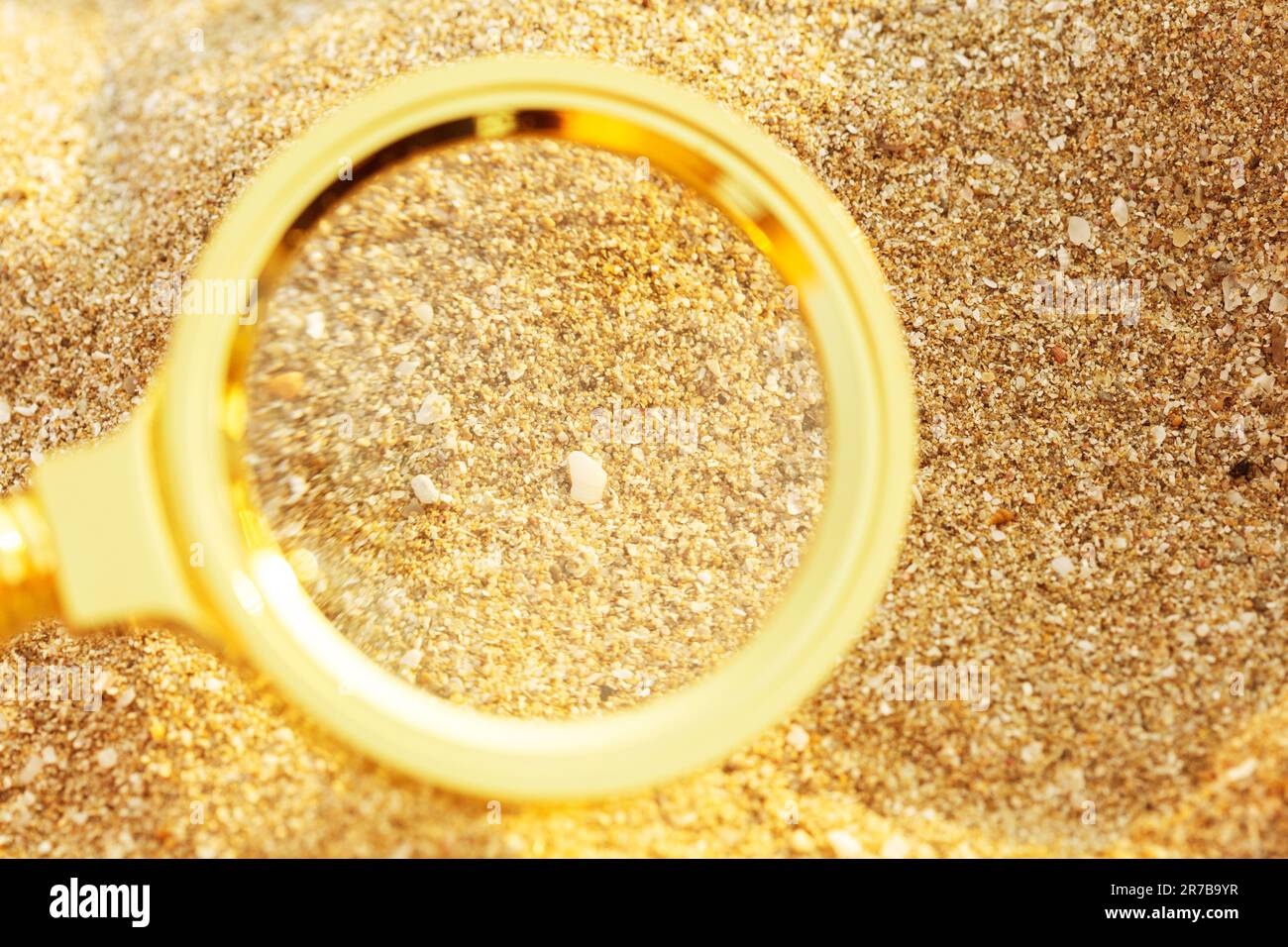 magnifying glass on the beach Stock Photo - Alamy