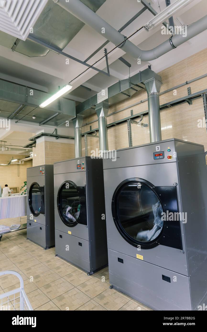 Line of laundry machine, washing machines. Automate equipment Stock ...