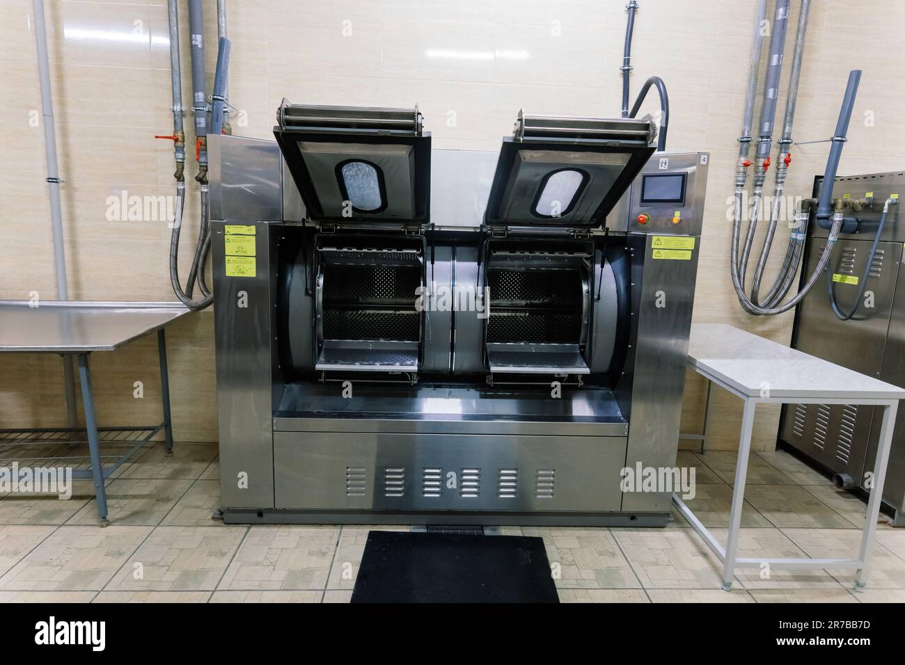 Line of laundry machine, washing machines. Automate equipment Stock ...