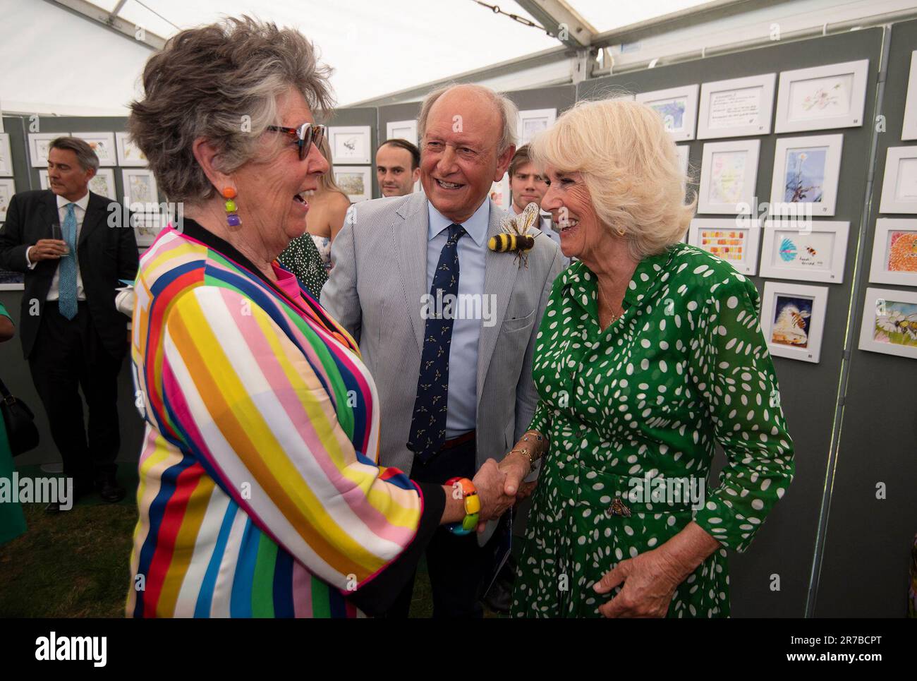 Queen Camilla speaks with Prue Leith (left) and Charlie Ross (centre ...