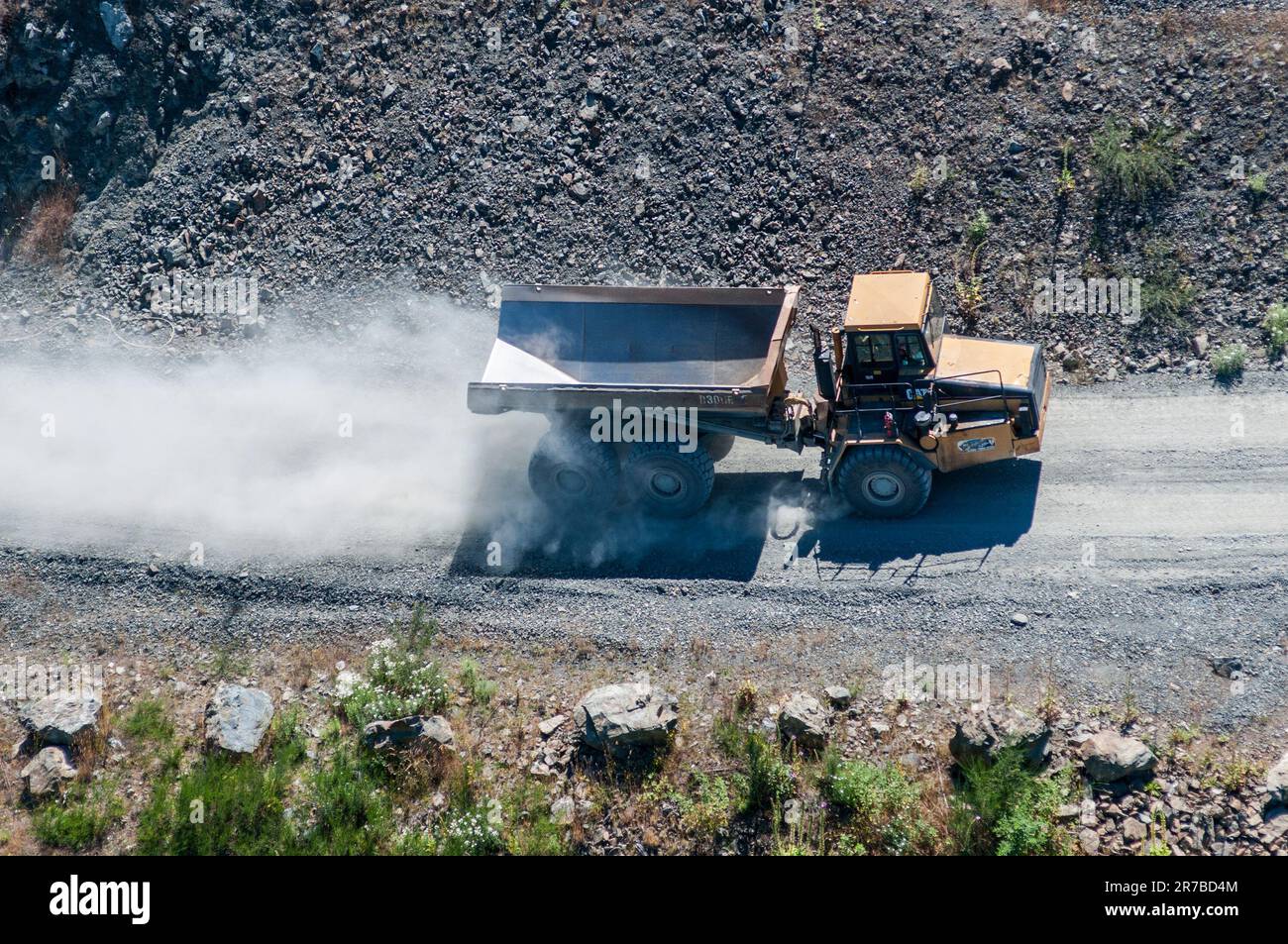 Aerial of dumptruck working in a landfill area Stock Photo - Alamy