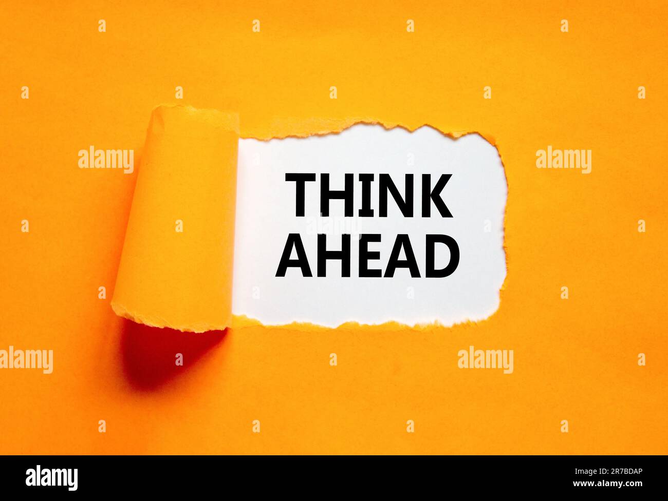 Think ahead symbol. Concept words Think ahead on beautiful white paper ...