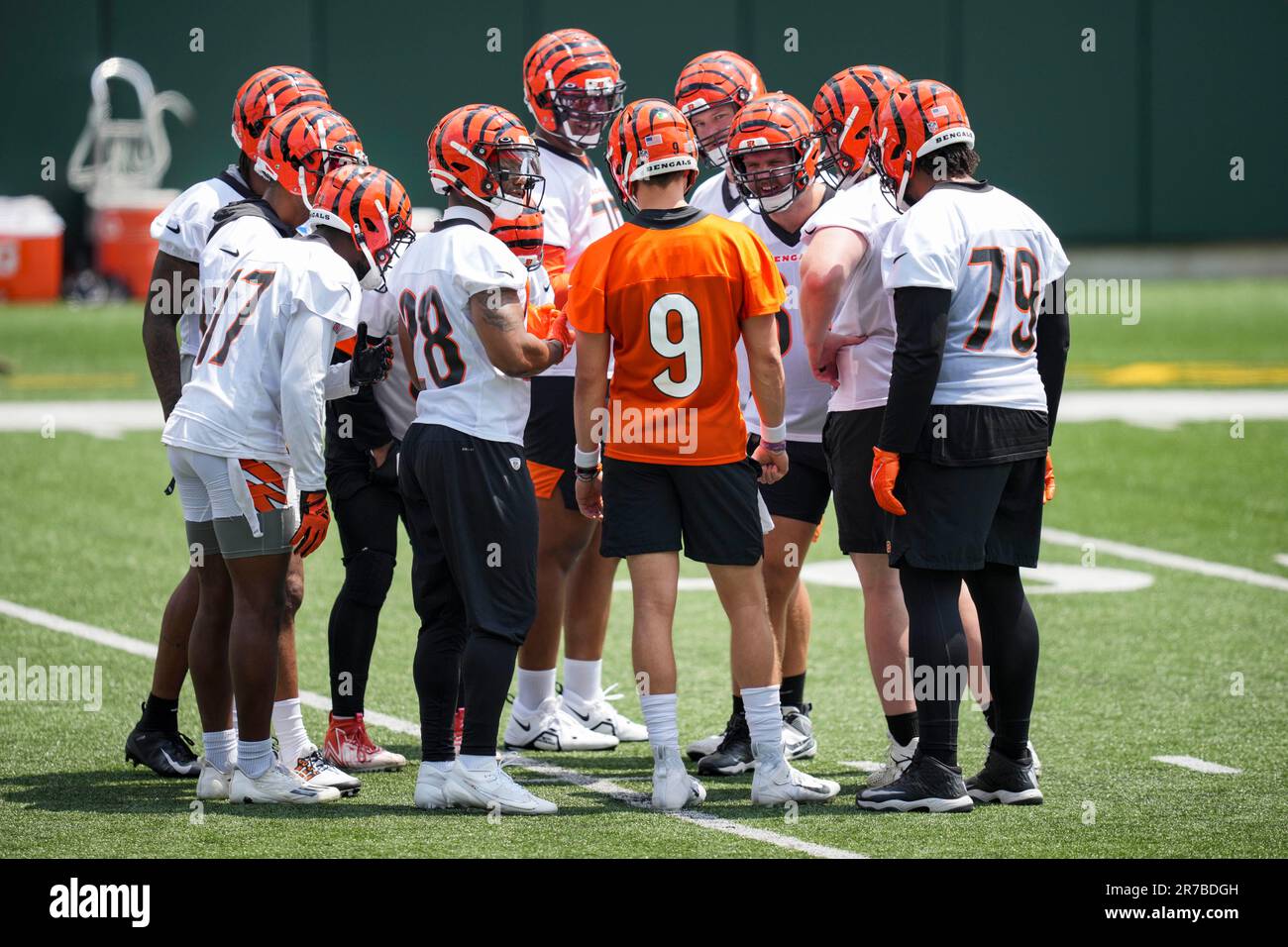 Cincinnati Bengals' Joe Burrow leads a team huddle on the field during ...