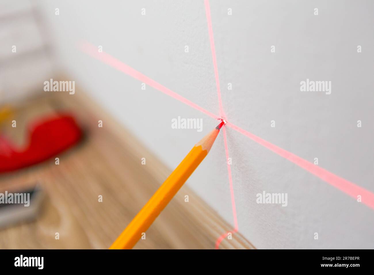 Laser level and lines on the wall Stock Photo - Alamy