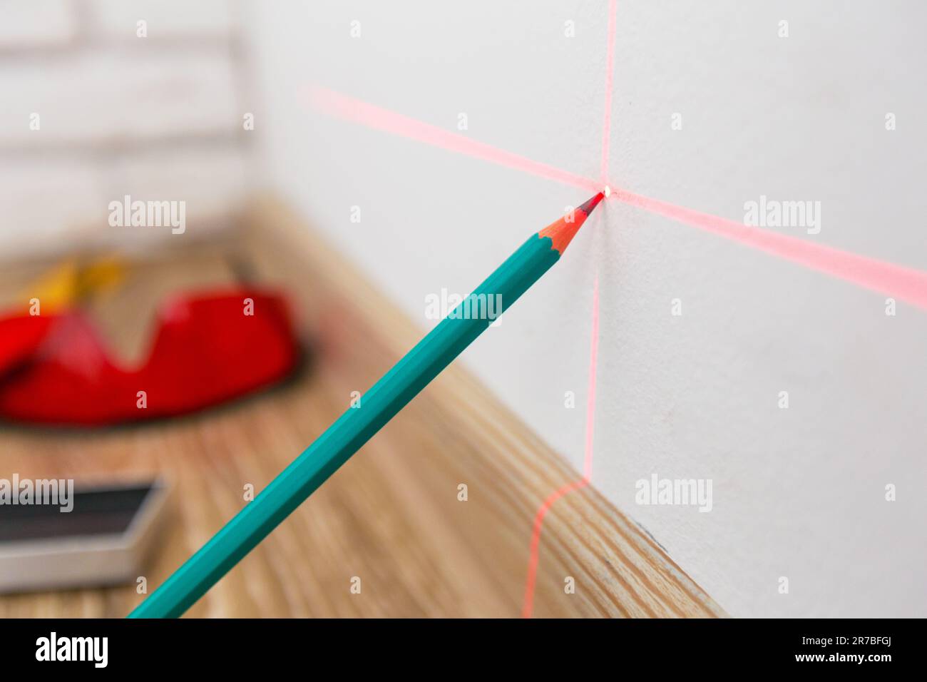 Laser level and lines on the wall Stock Photo - Alamy