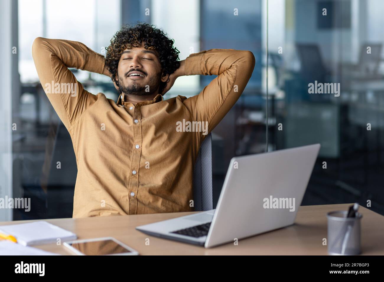 Task successfully completed and job well done, businessman typing away ...