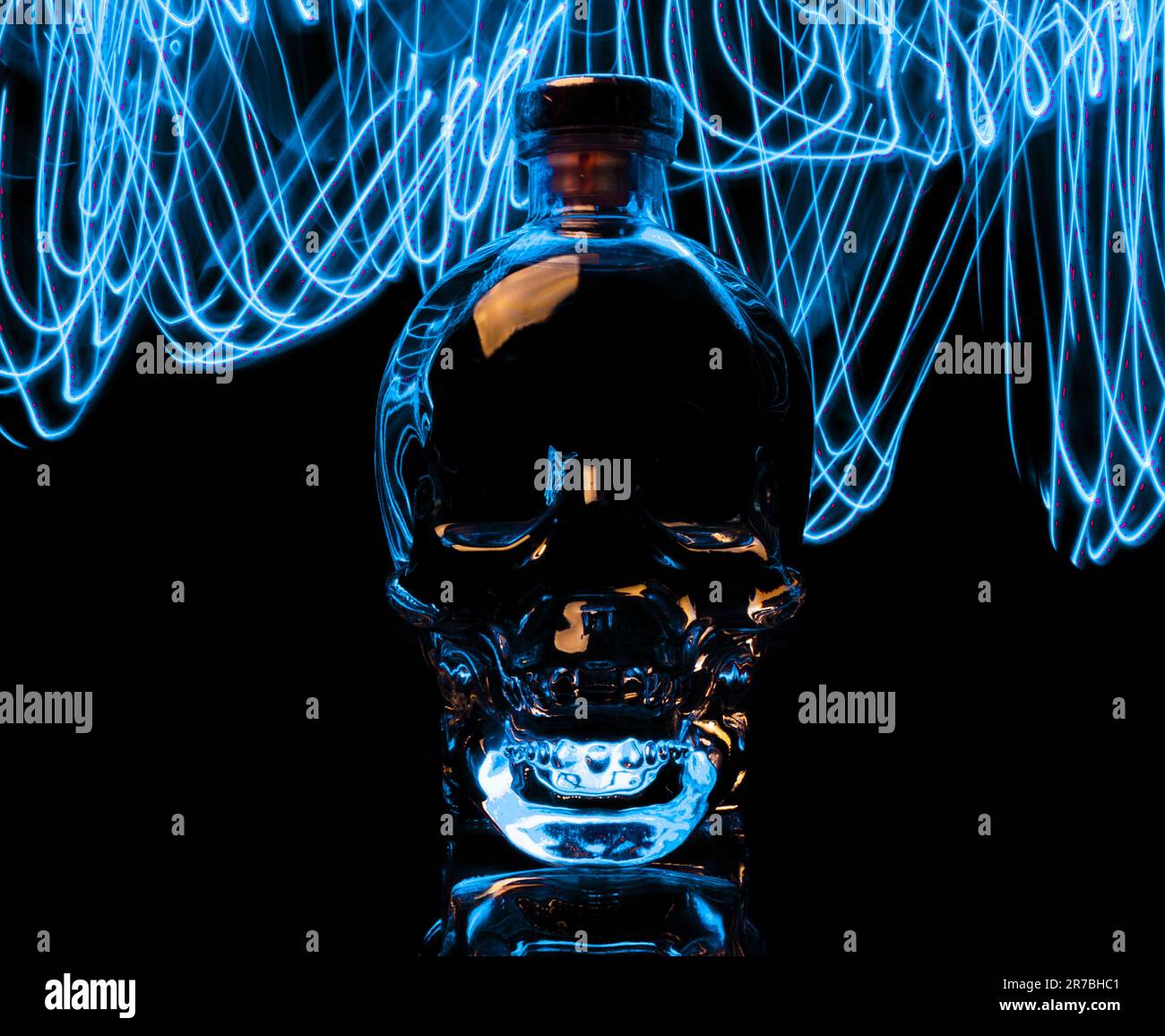 Crystal head vodka on black background with lightpainting led Stock ...