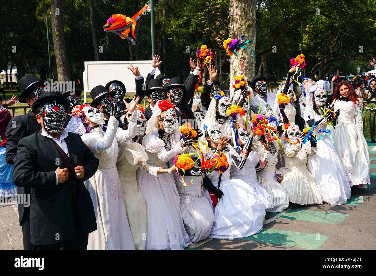 Skeleton Catrina brides pose together during the Grand Parade ...