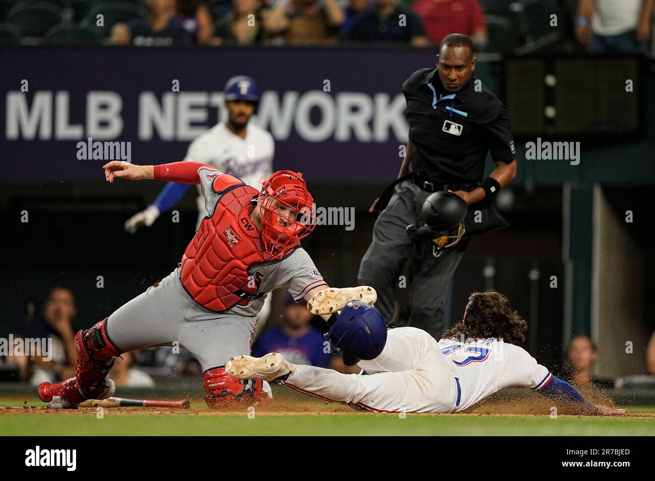 Texas Rangers' Josh Smith (47) is tagged out at home by Los Angeles ...