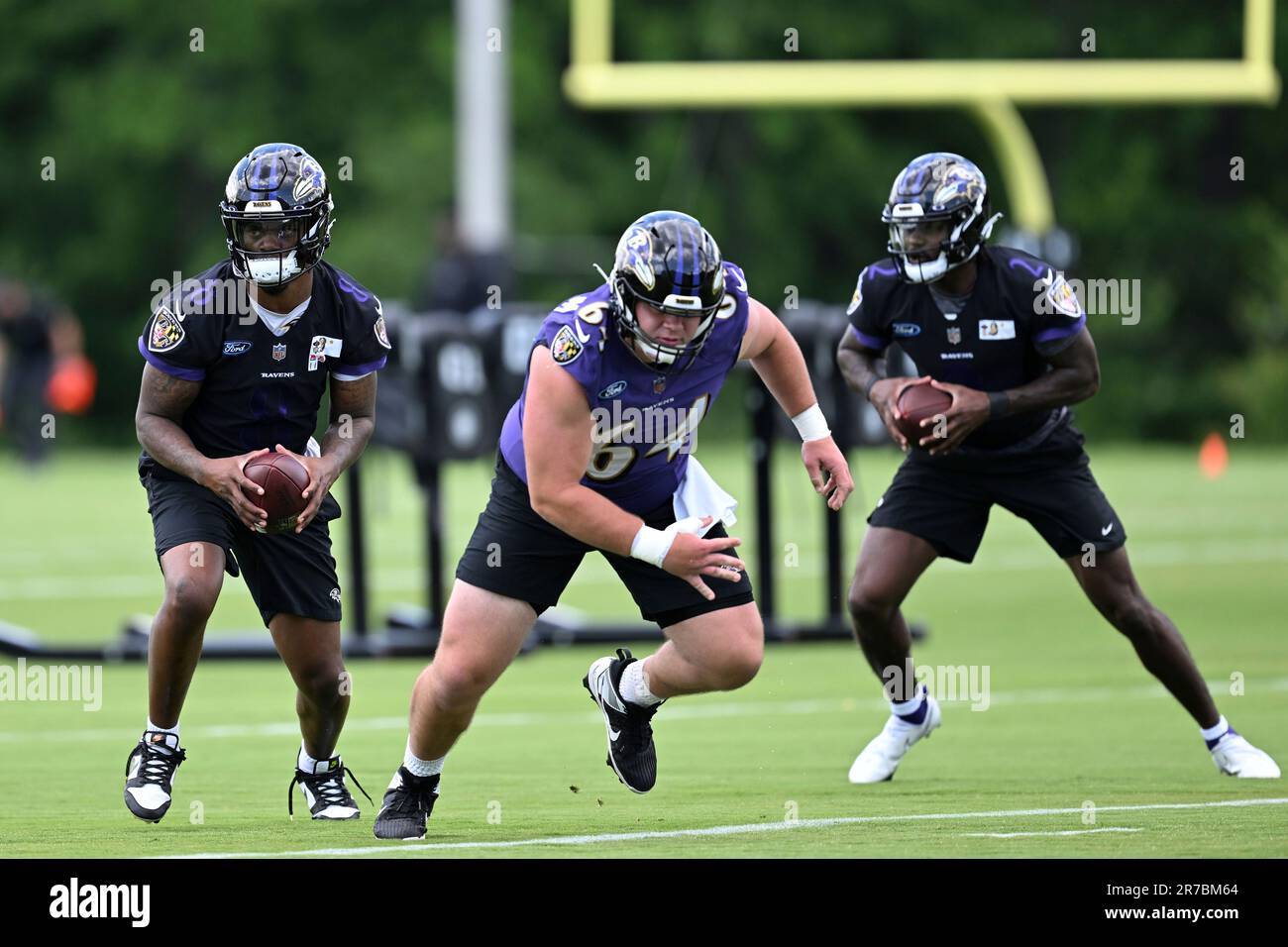 Baltimore Ravens quarterback Lamar Jackson, left, Tyler Linderbaum ...