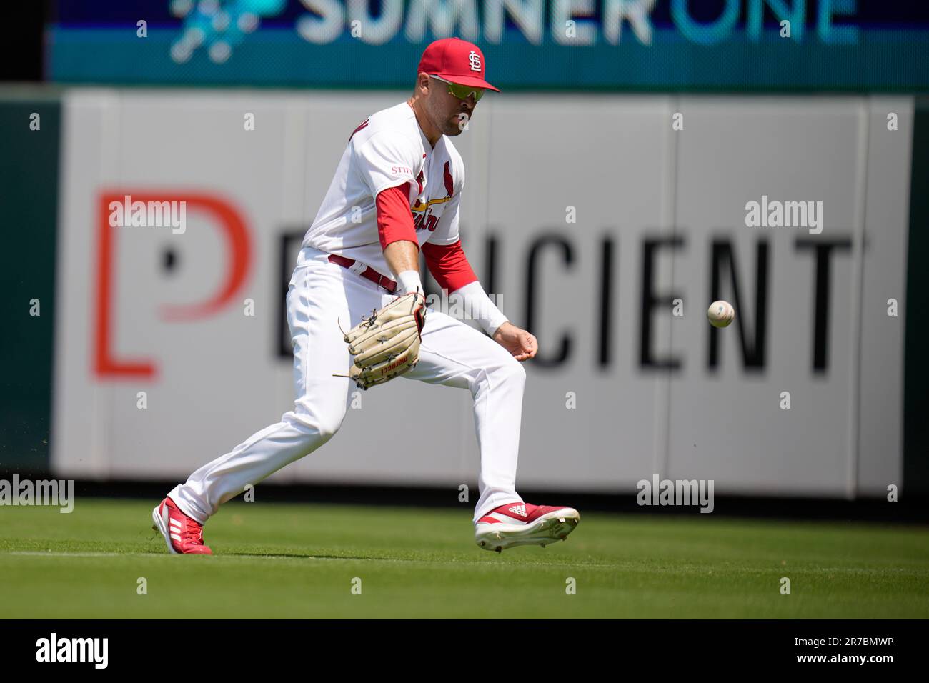 St. Louis Cardinals right fielder Dylan Carlson reaches for a double by ...