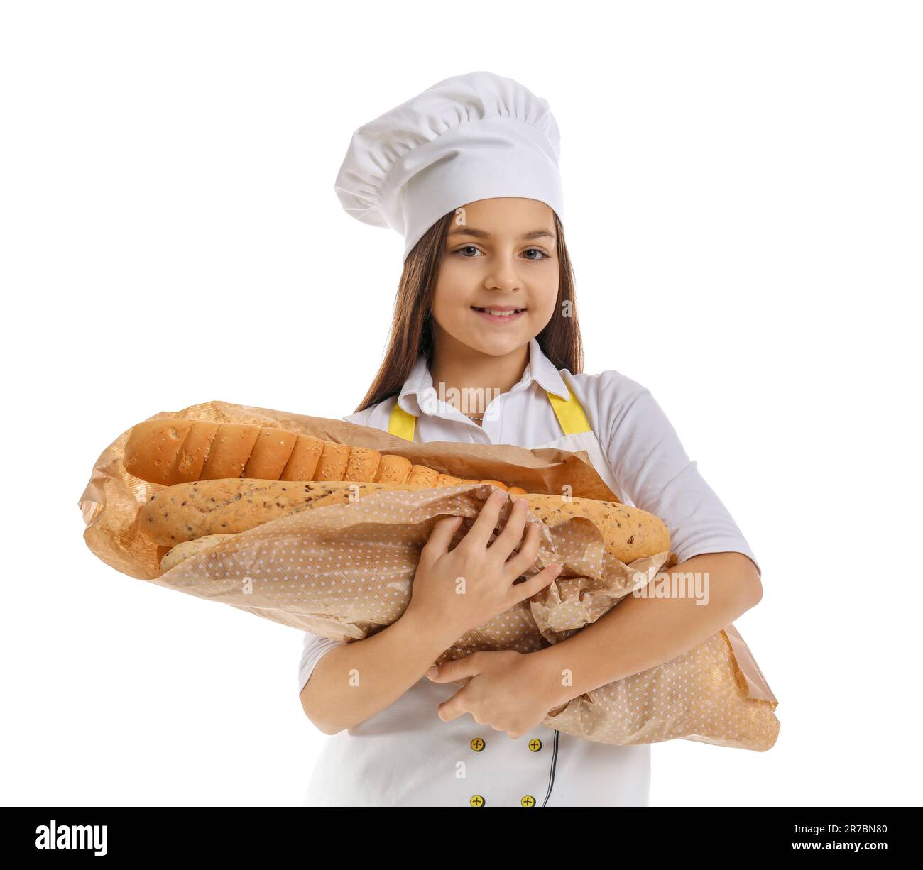 Little baker with fresh baguettes on white background Stock Photo - Alamy