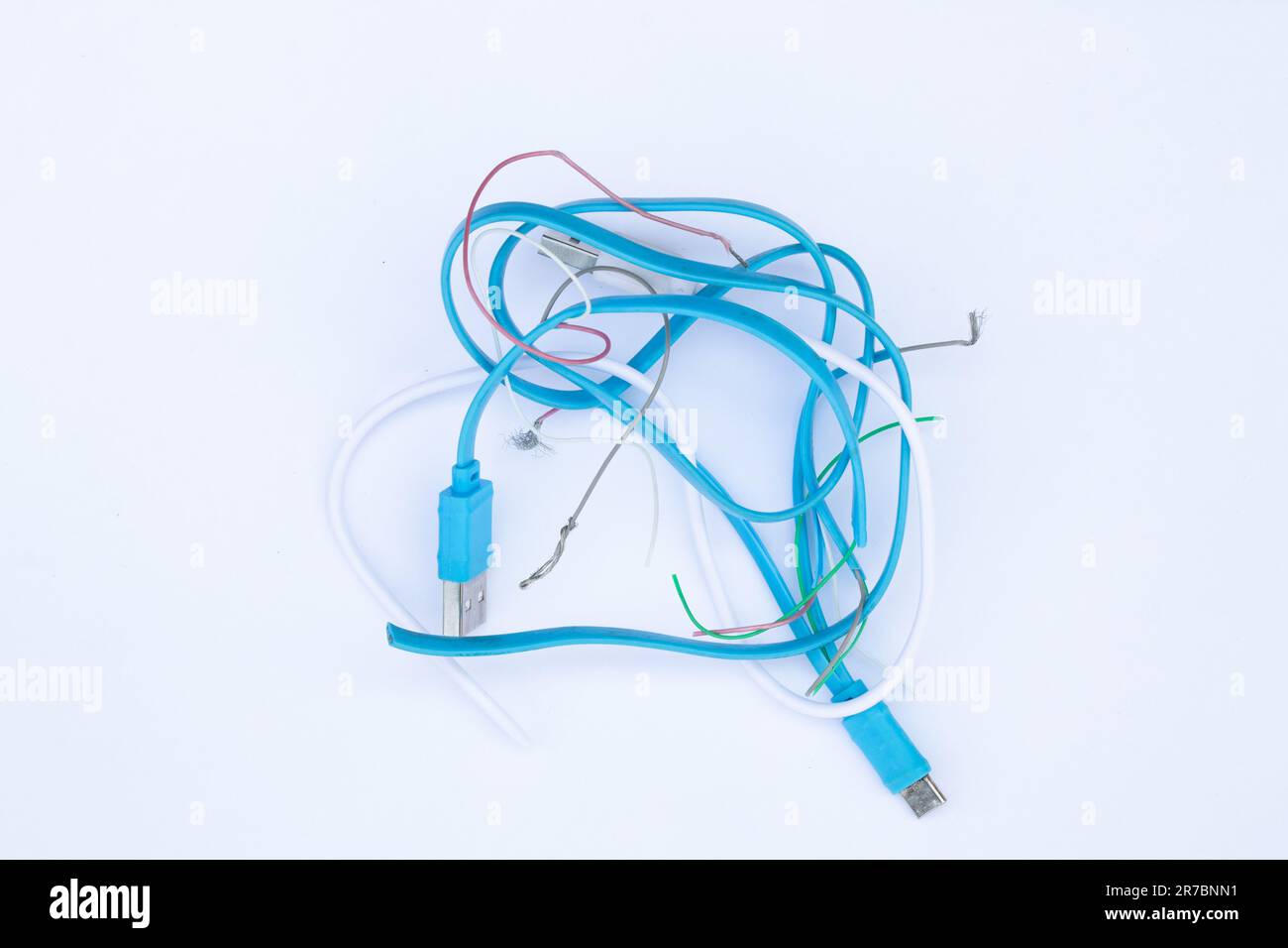 heap of cut usb wires on white background Stock Photo - Alamy