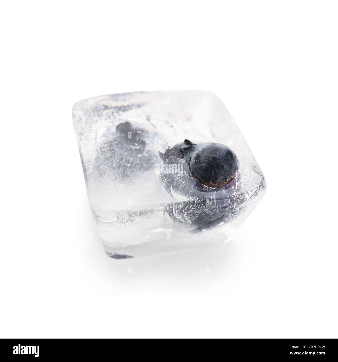 Fresh blueberry frozen in ice cube on white background Stock Photo - Alamy