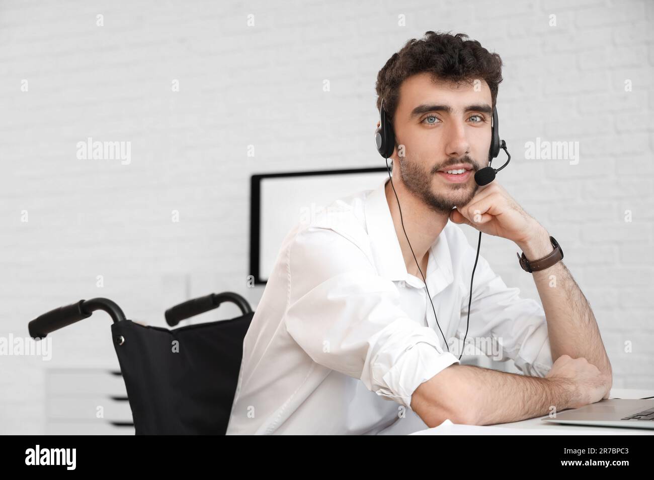 Male office manager disability working hi-res stock photography and ...