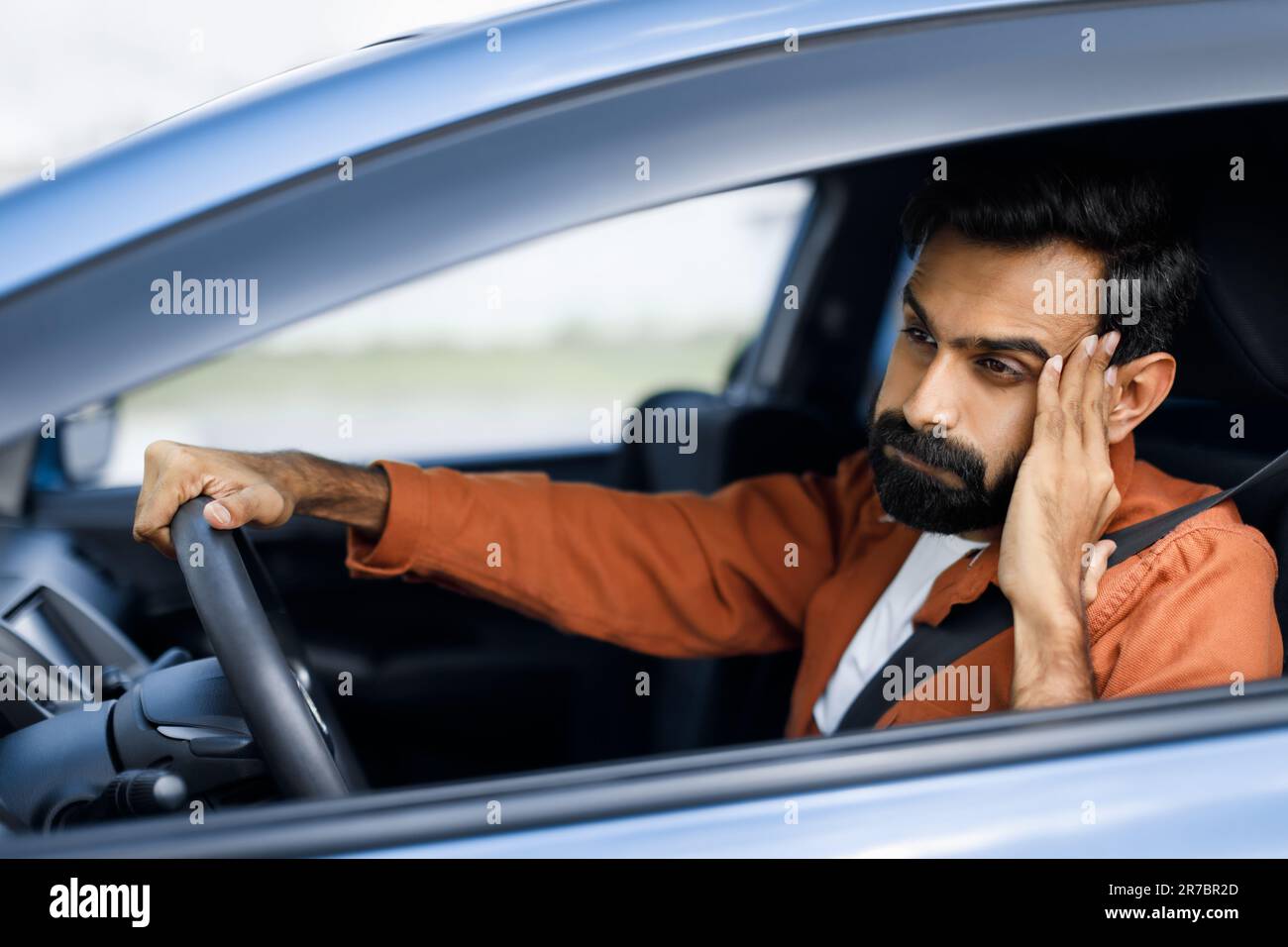 Discontented Middle Eastern Driver Man Driving Vehicle During Car ...