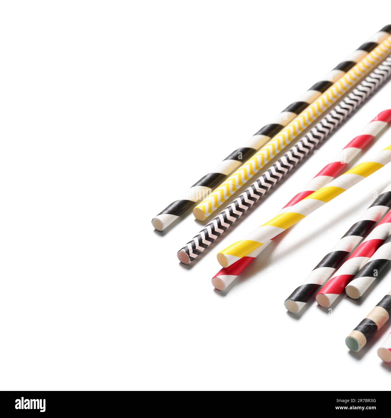 Different paper drinking straws on white background Stock Photo - Alamy