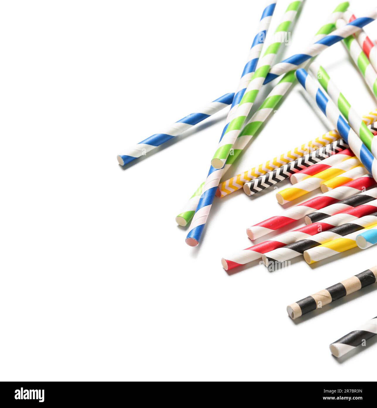Different paper drinking straws on white background Stock Photo - Alamy
