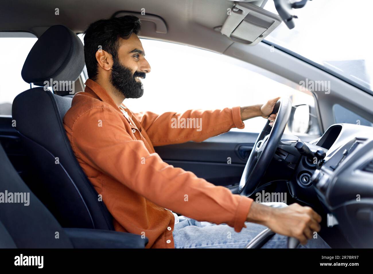 Side View Of Cheerful Middle Eastern Man Driving Comfortable Auto Stock ...